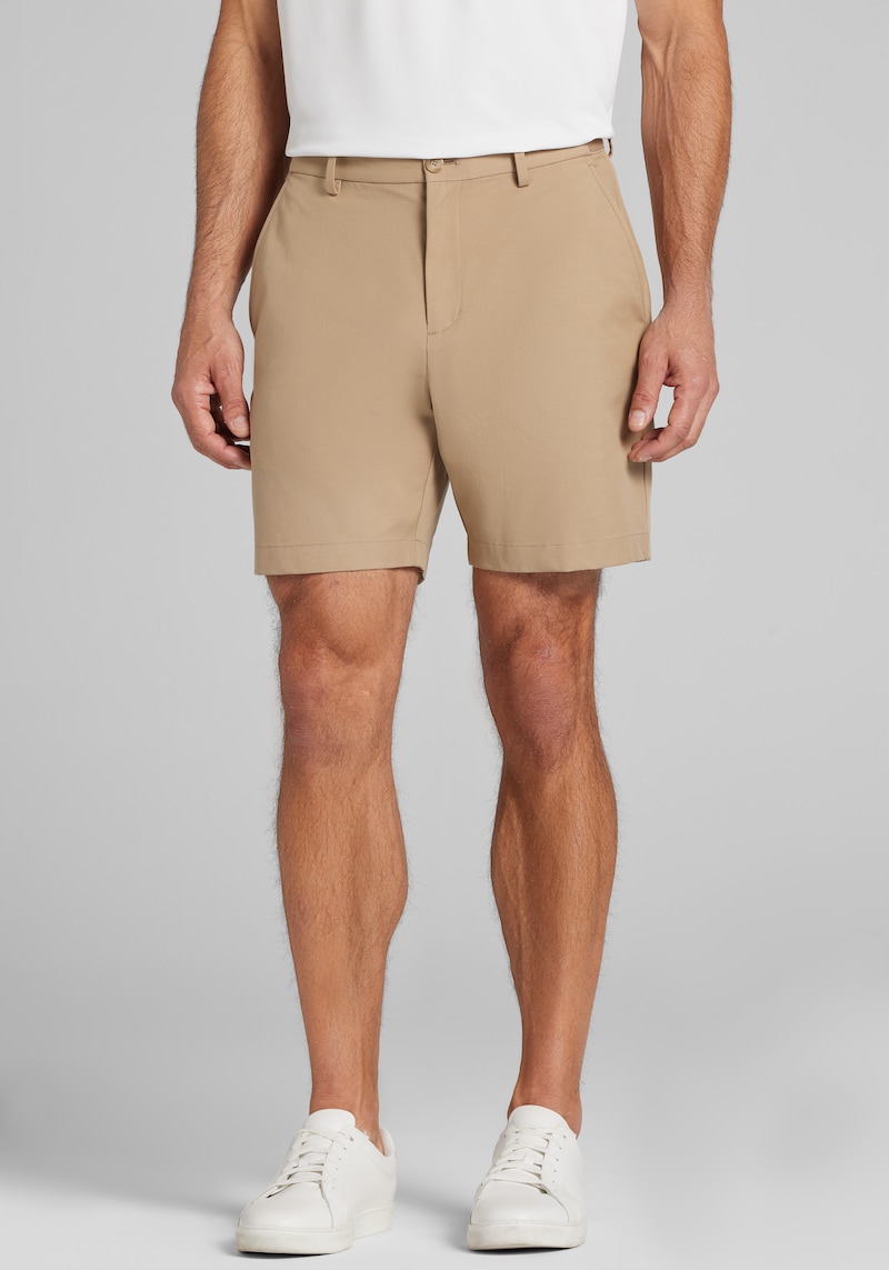 Click here for Mens Traveler® Performance Tailored Fit Solid Golf... prices